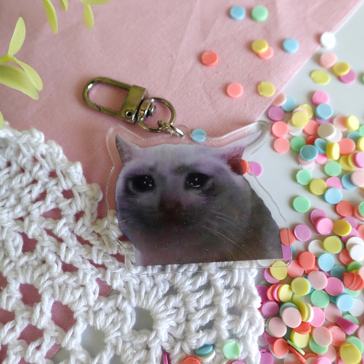cat crying keychain